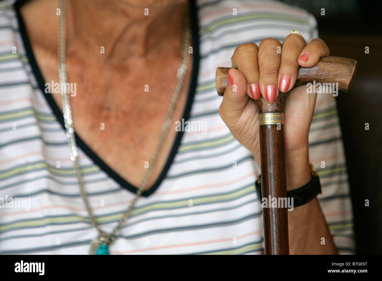 Lady with a cane hi-res stock photography and images - Alamy