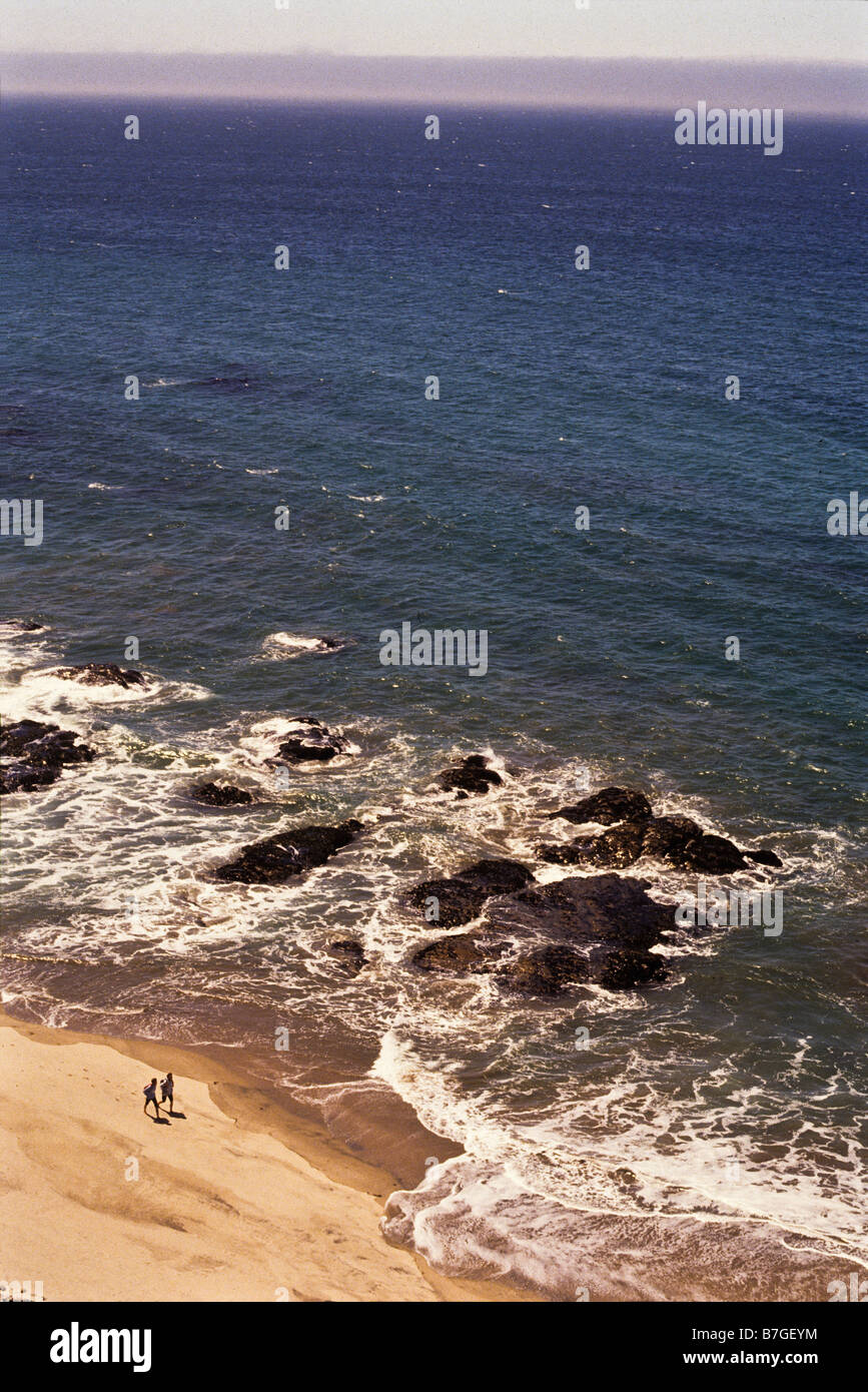 Two people walking over rocks hi-res stock photography and images - Alamy
