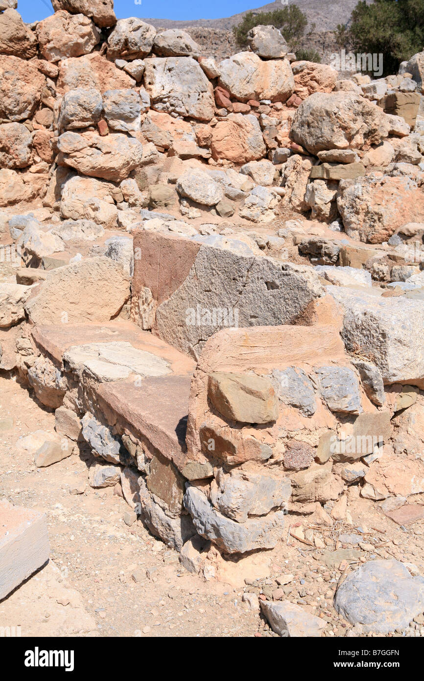 An ancient stone seat among the ruins of the Minoan palace at Zakros ...