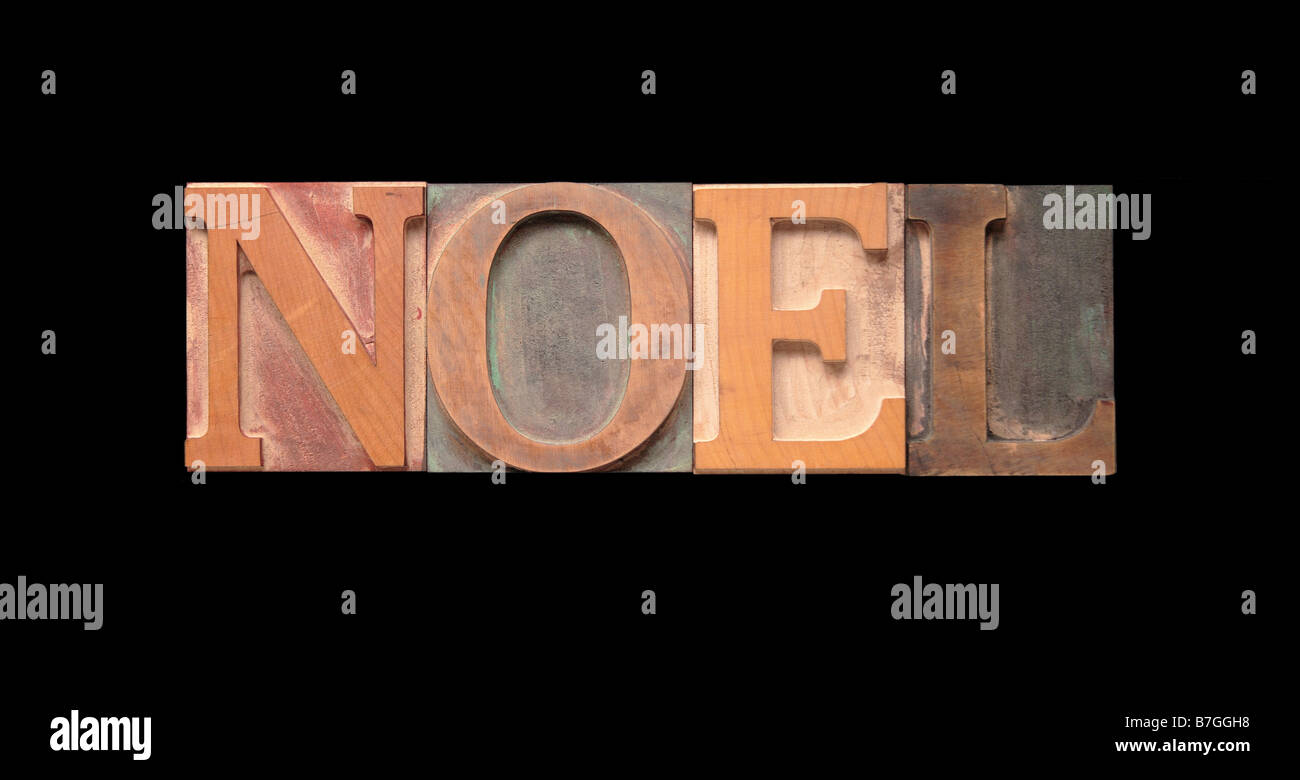 the word 'noel' in old ink-stained wood type Stock Photo - Alamy