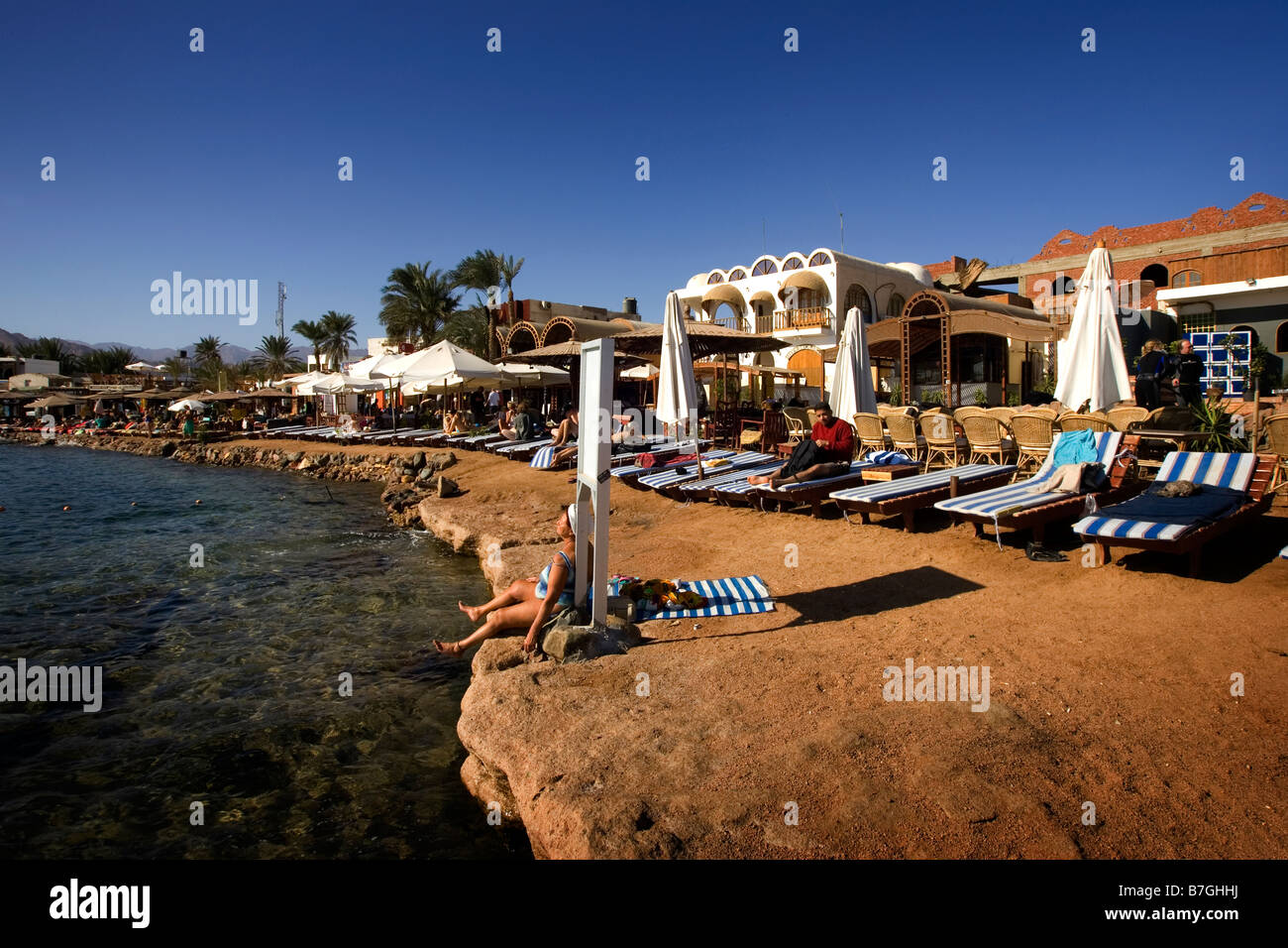 Tourists on the beach, Dahab, Egypt Stock Photo - Alamy