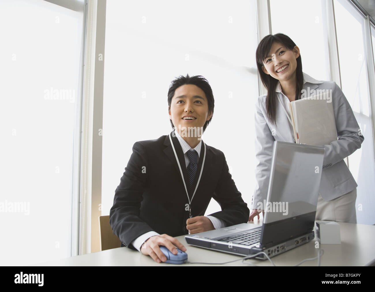 Businesswoman wearing office suits hi-res stock photography and images ...