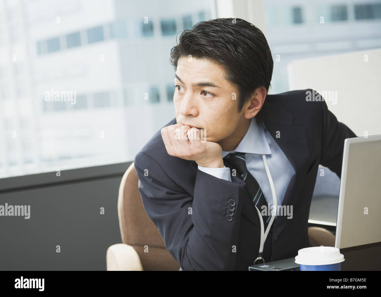 Businessman thinking something Stock Photo - Alamy