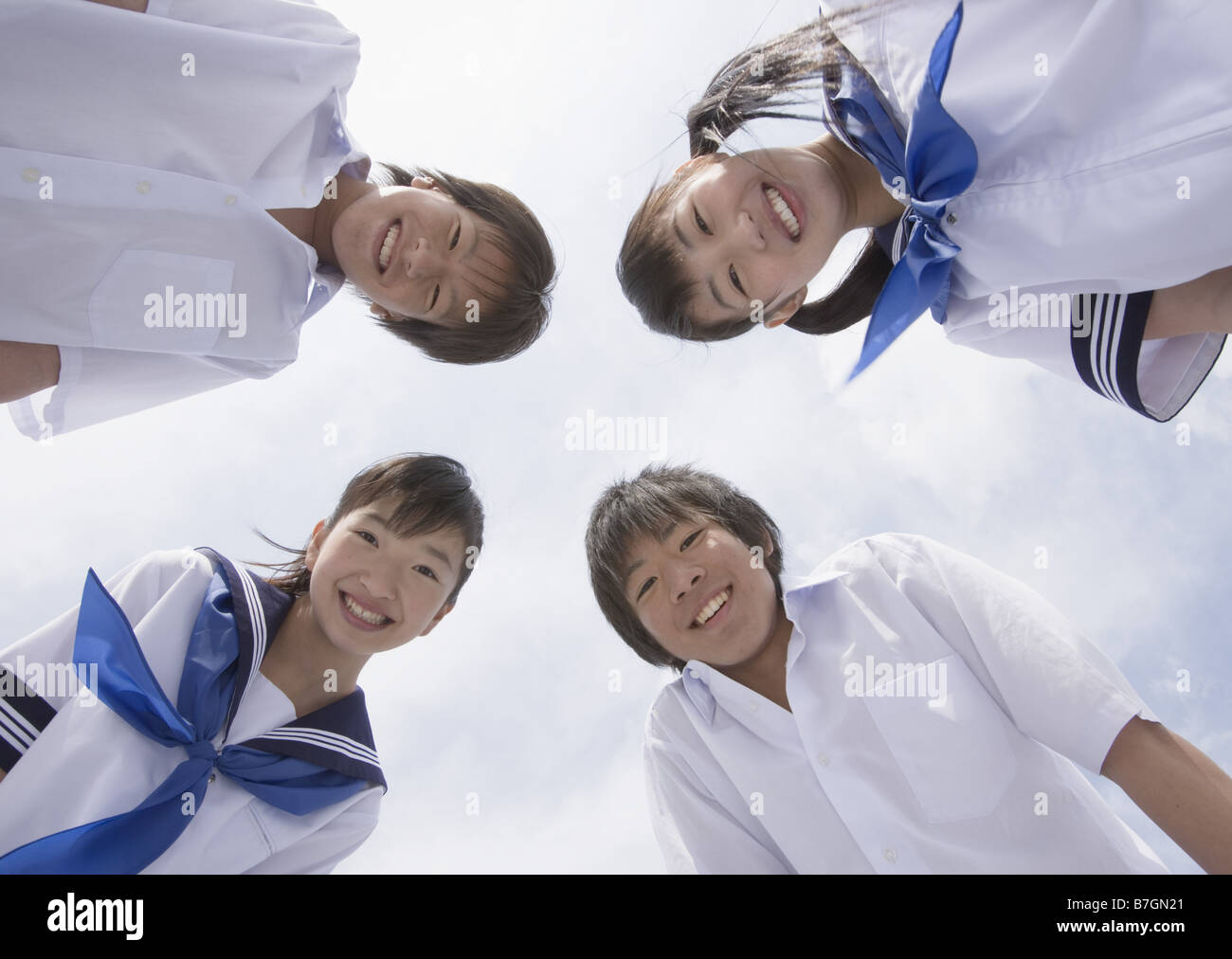 Students standing in a circle Stock Photo - Alamy