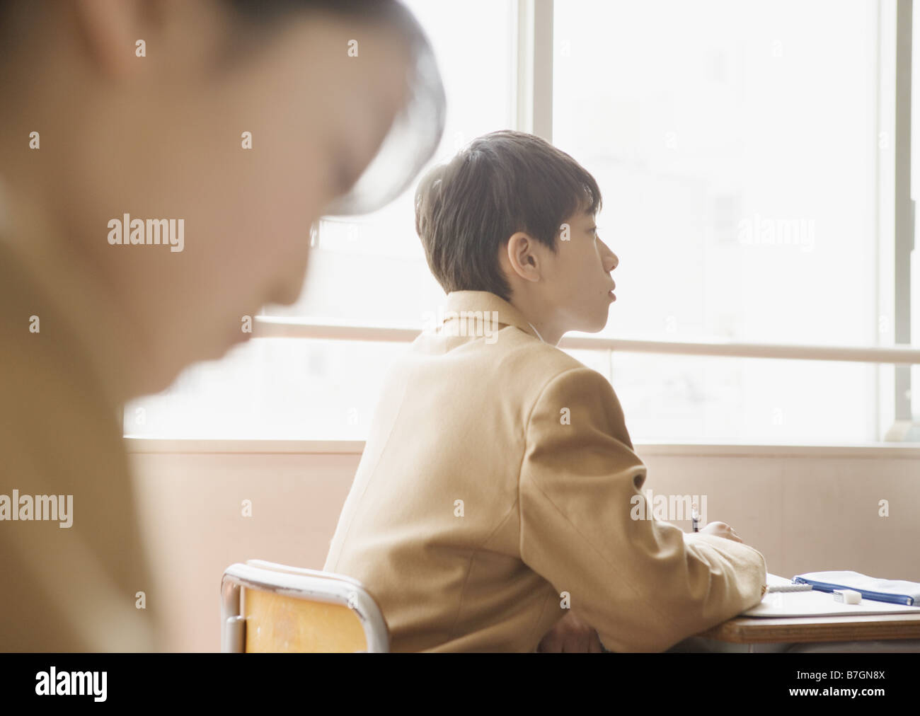 Student in classroom Stock Photo - Alamy