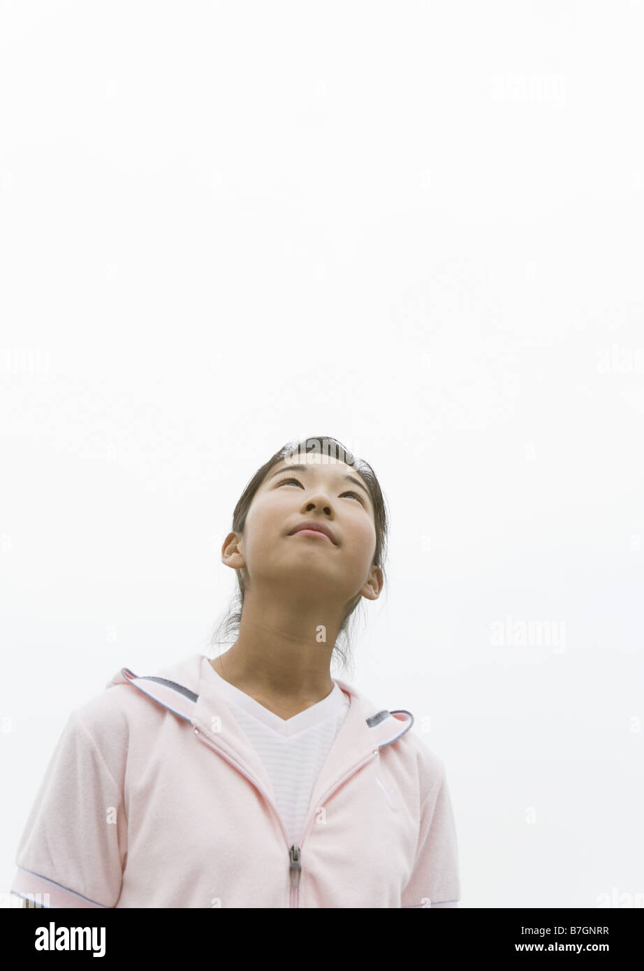 Girl looking up the sky Stock Photo - Alamy