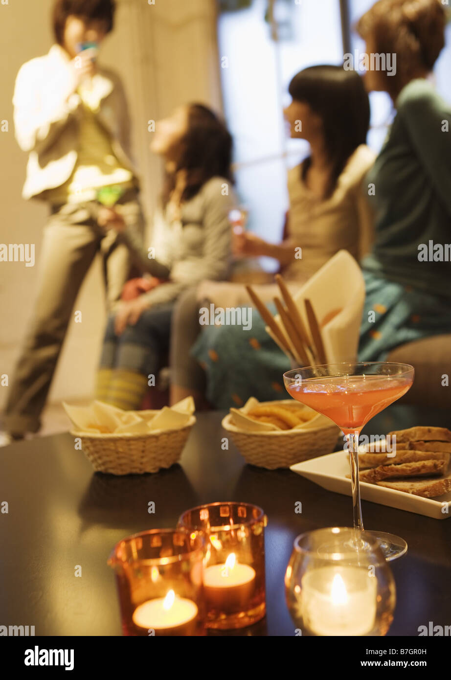 Friends talking at party Stock Photo - Alamy