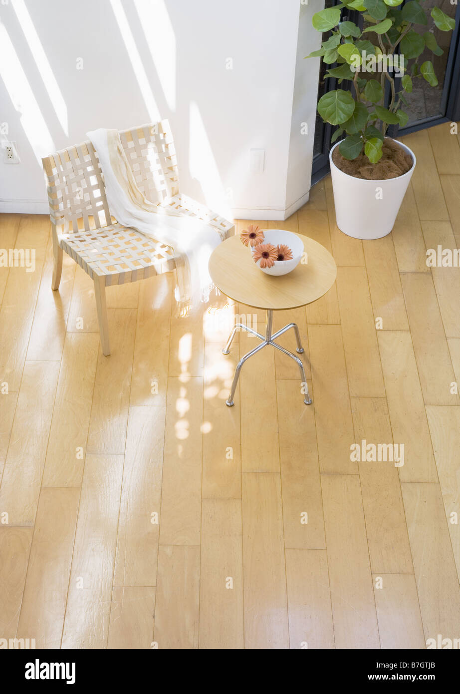 Chair and side table Stock Photo - Alamy