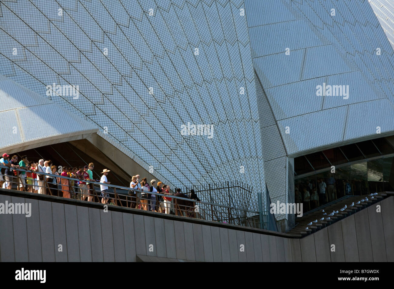 close up of people standing by a handrail on sydney opera house Stock ...