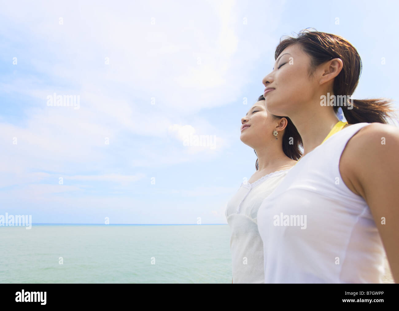 Women at seashore Stock Photo - Alamy