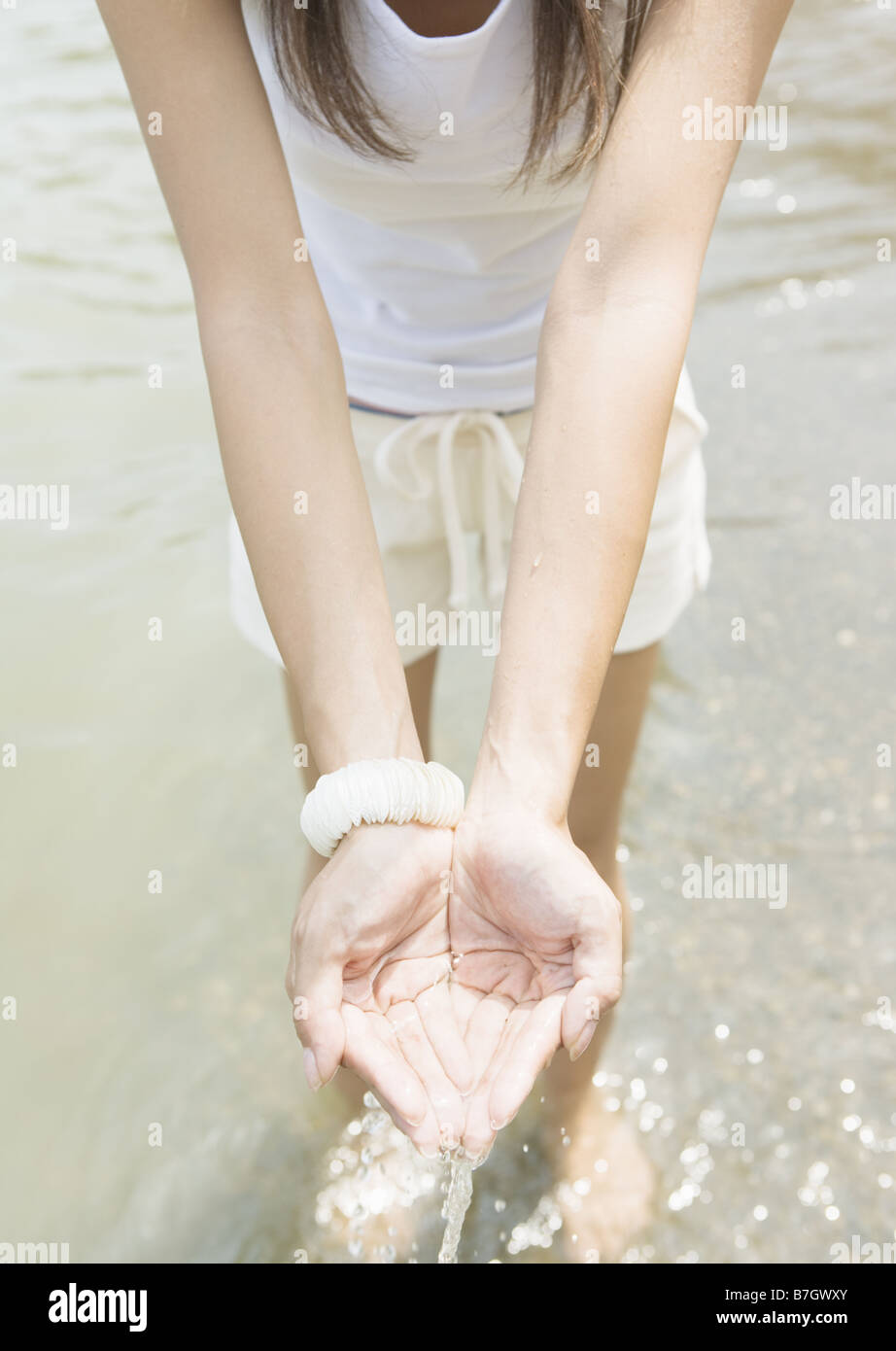 Scooping sea water hi-res stock photography and images - Alamy