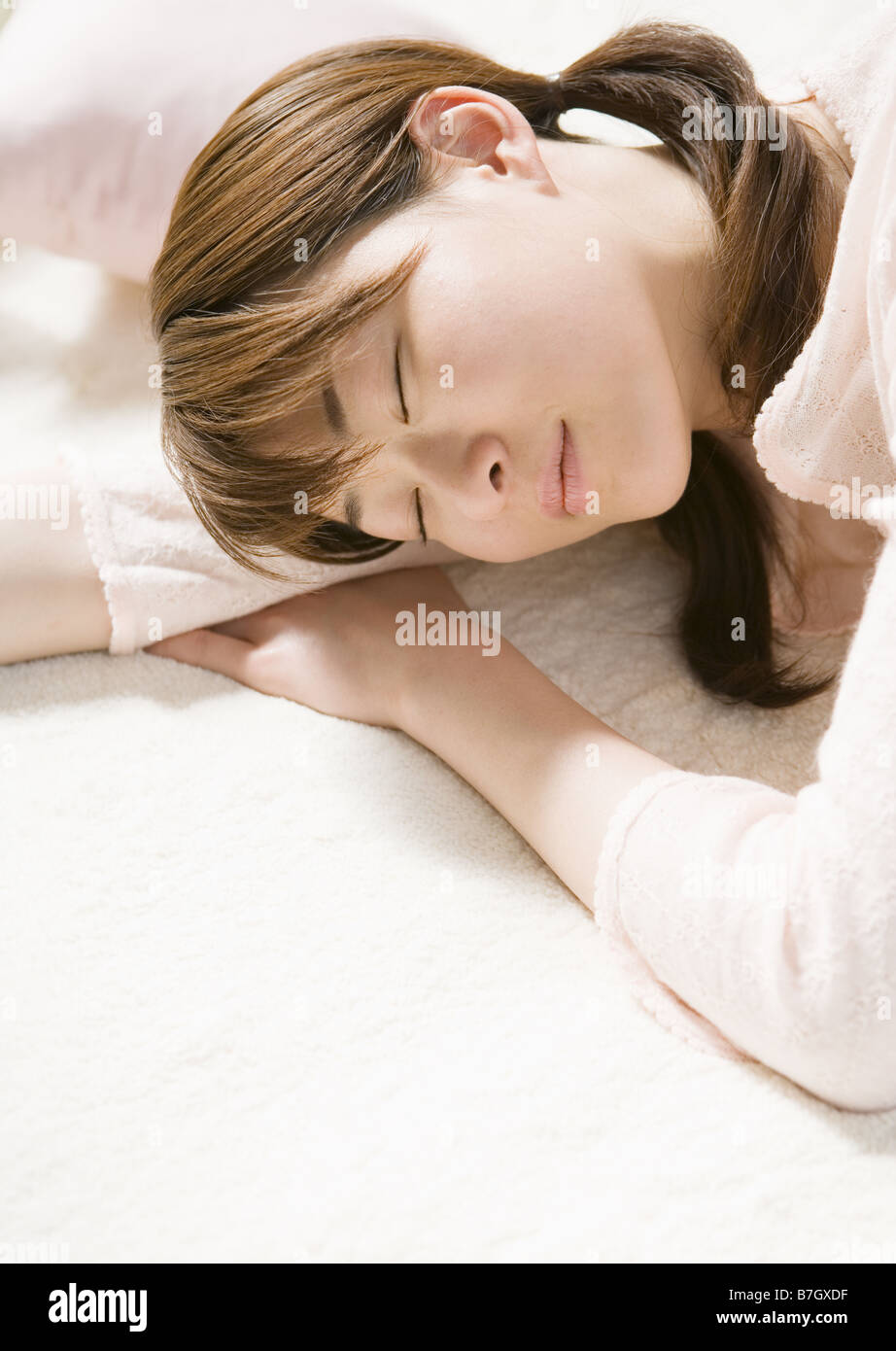 Young Woman Taking a nap Stock Photo - Alamy