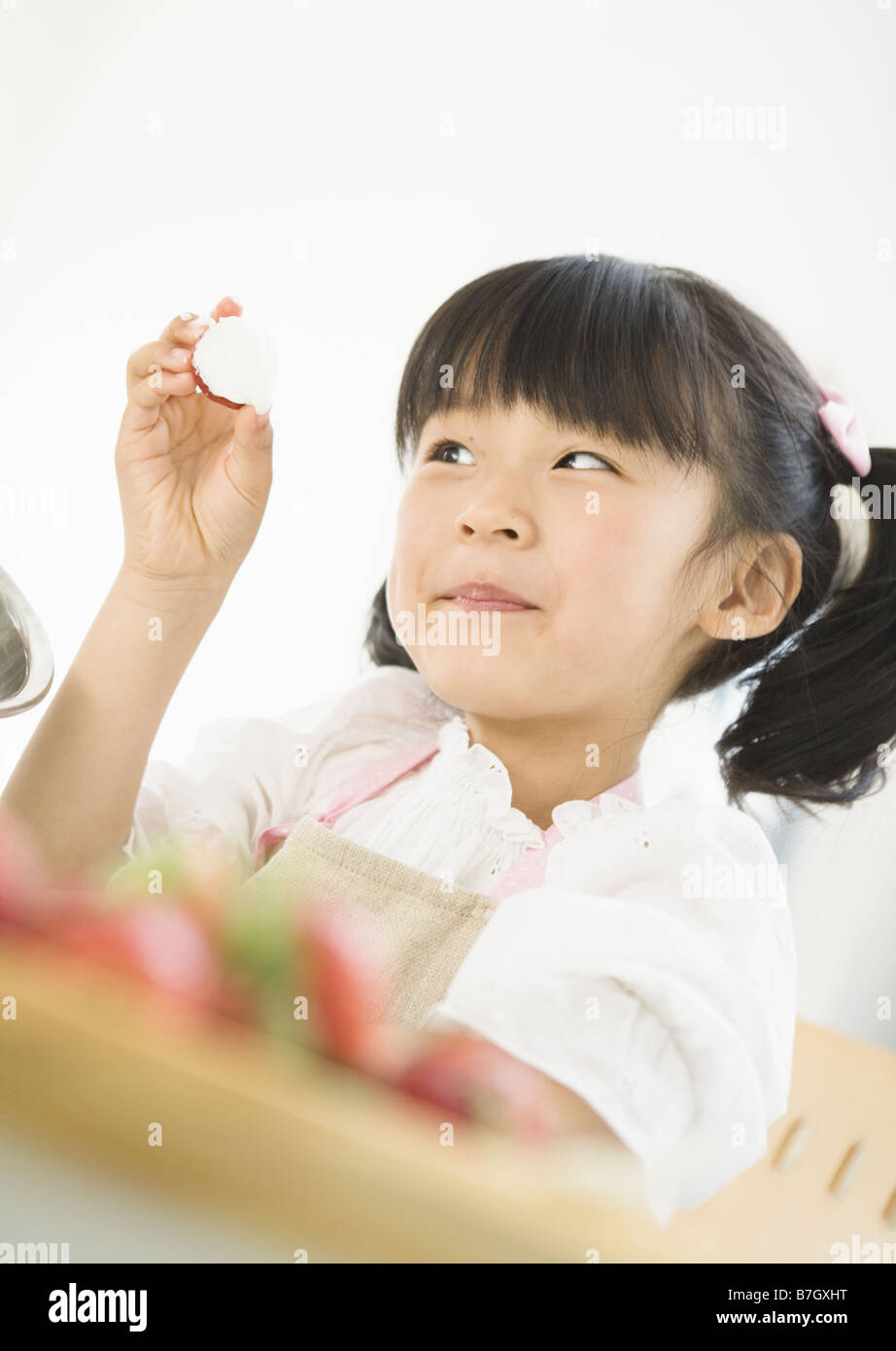 Girl Making a Cake Stock Photo - Alamy