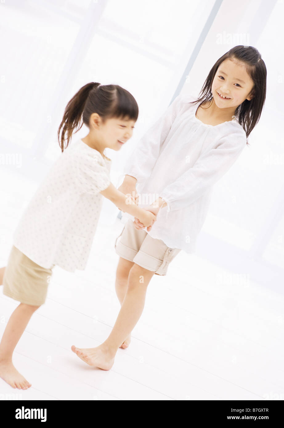 Sisters Having Fun Stock Photo - Alamy