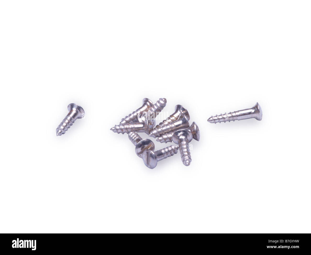 some chrome screws isolated on white background Stock Photo - Alamy