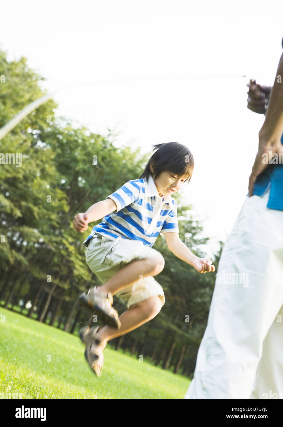 A boy jumping rope Stock Photo - Alamy