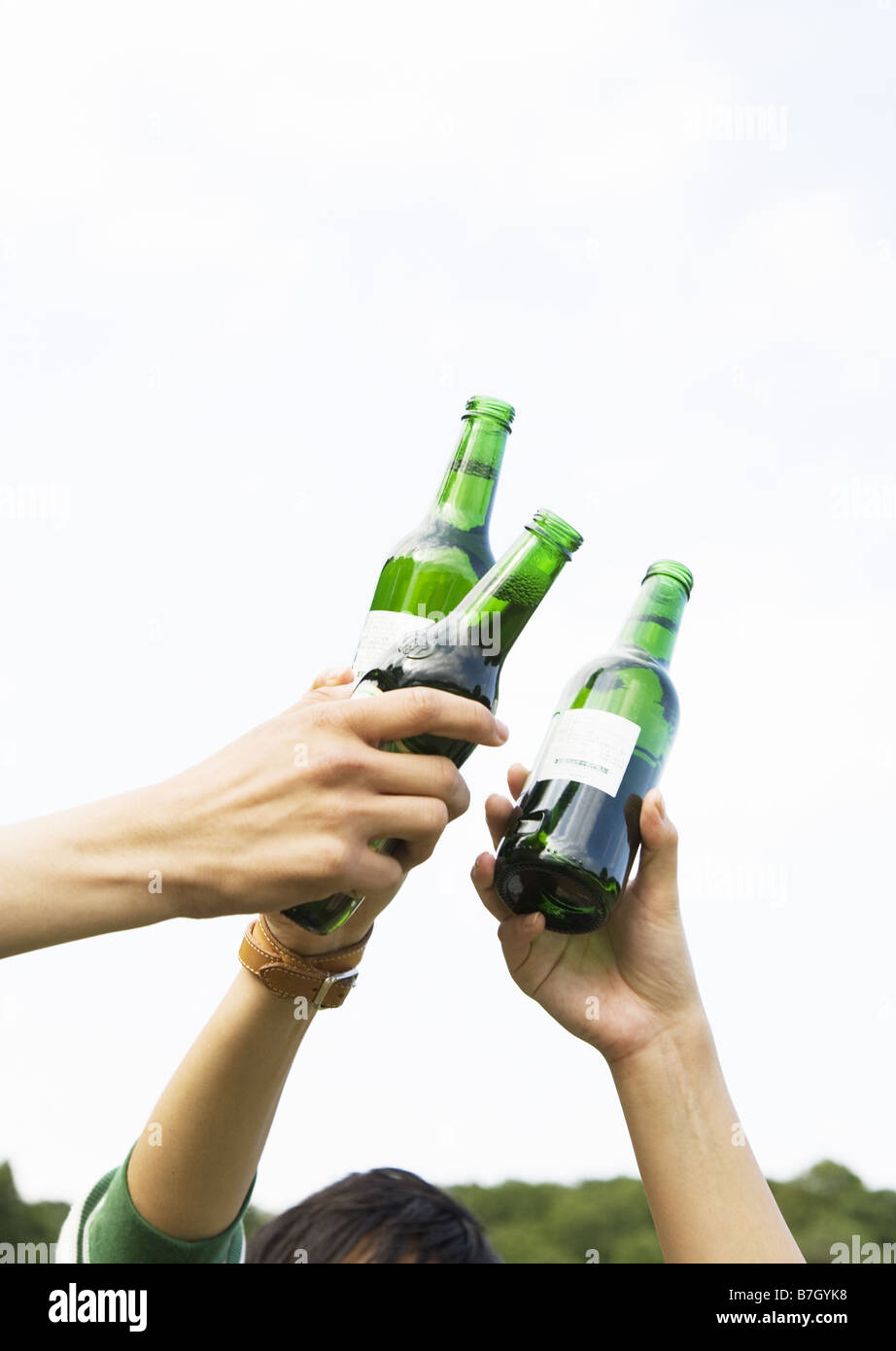 Making a toast with beer Stock Photo - Alamy