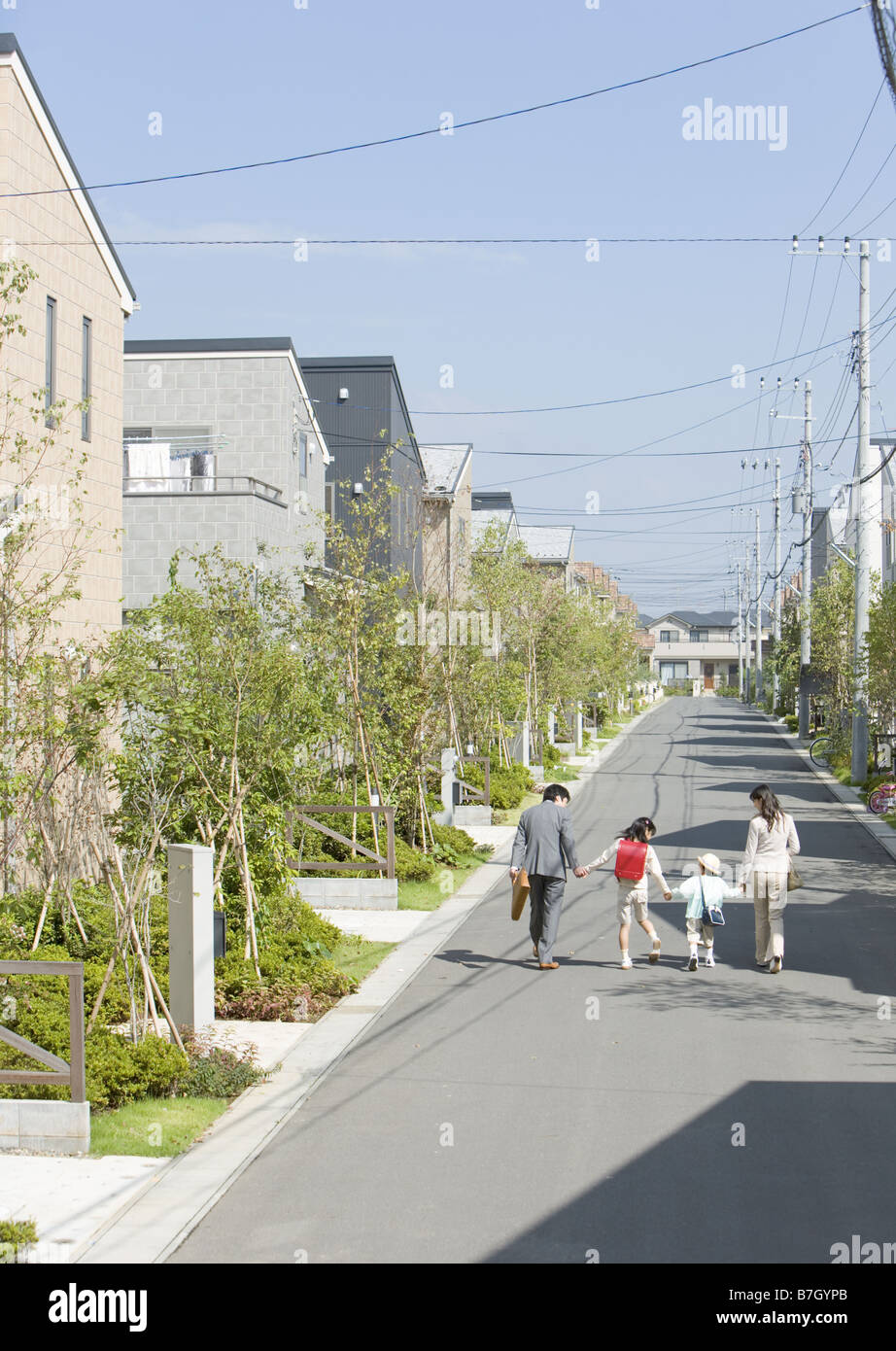 Family walking around residential district hi-res stock photography and ...