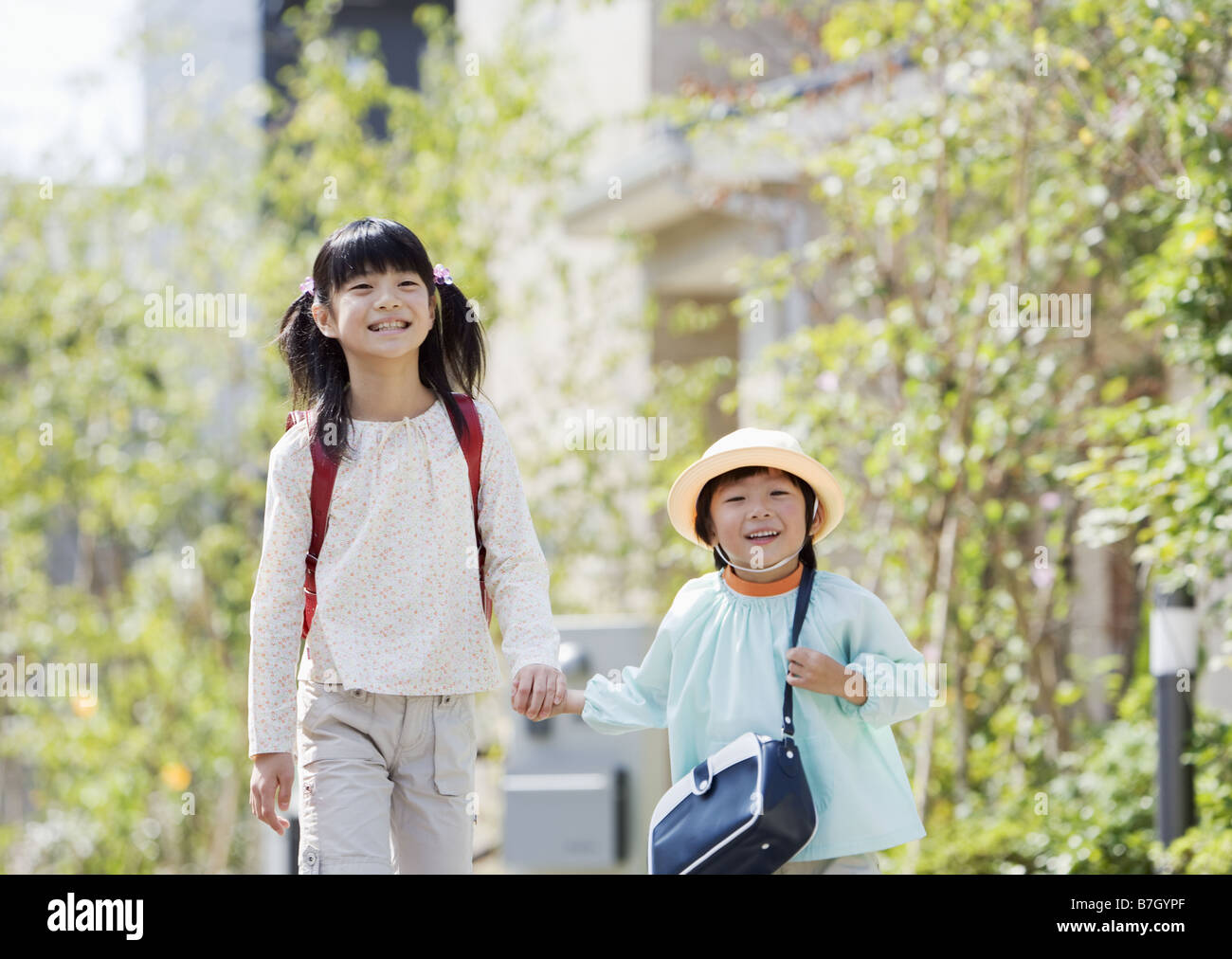 Children walking around the residential district Stock Photo - Alamy