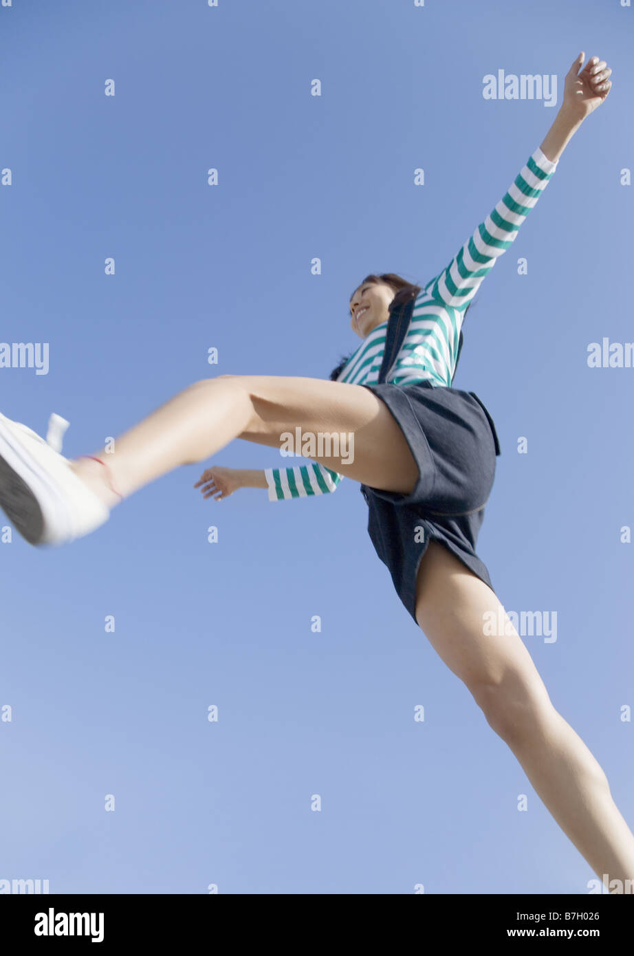 A woman jumping Stock Photo - Alamy