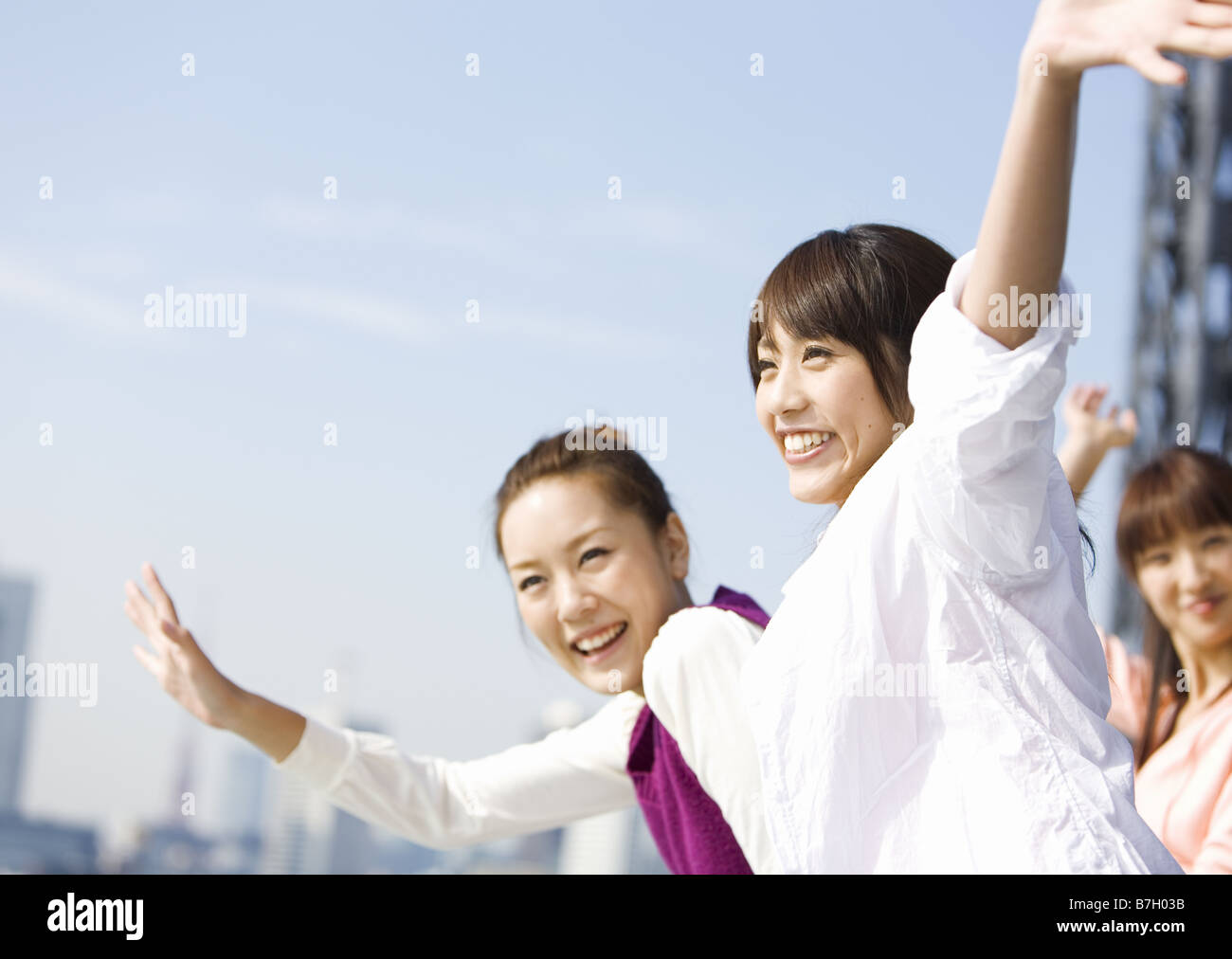 Women waving hi-res stock photography and images - Alamy