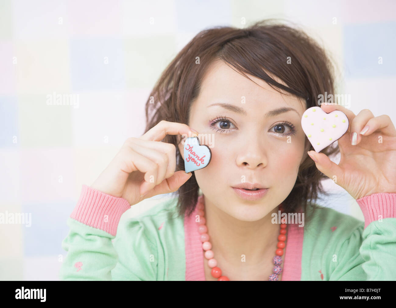 A woman holding cookies Stock Photo - Alamy
