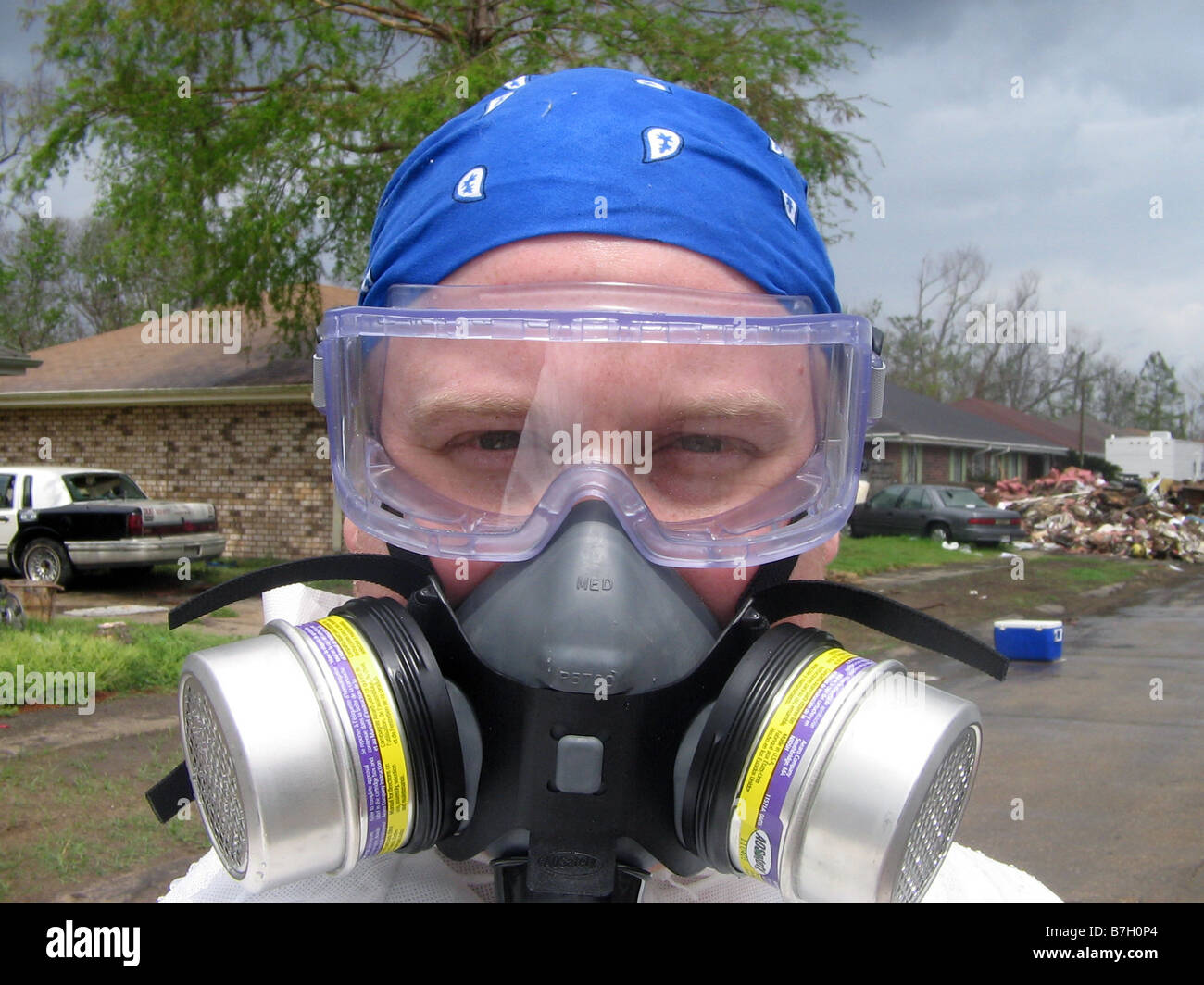 Man in mask after hurricane Katrina Stock Photo - Alamy