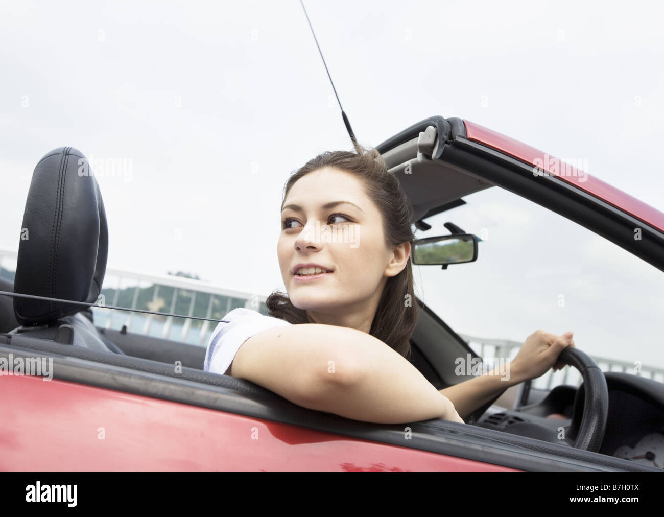 Woman turning around car hi-res stock photography and images - Alamy