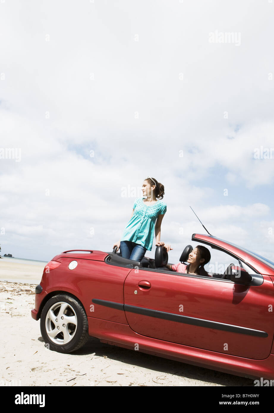 Two women in red convertible hi-res stock photography and images - Alamy
