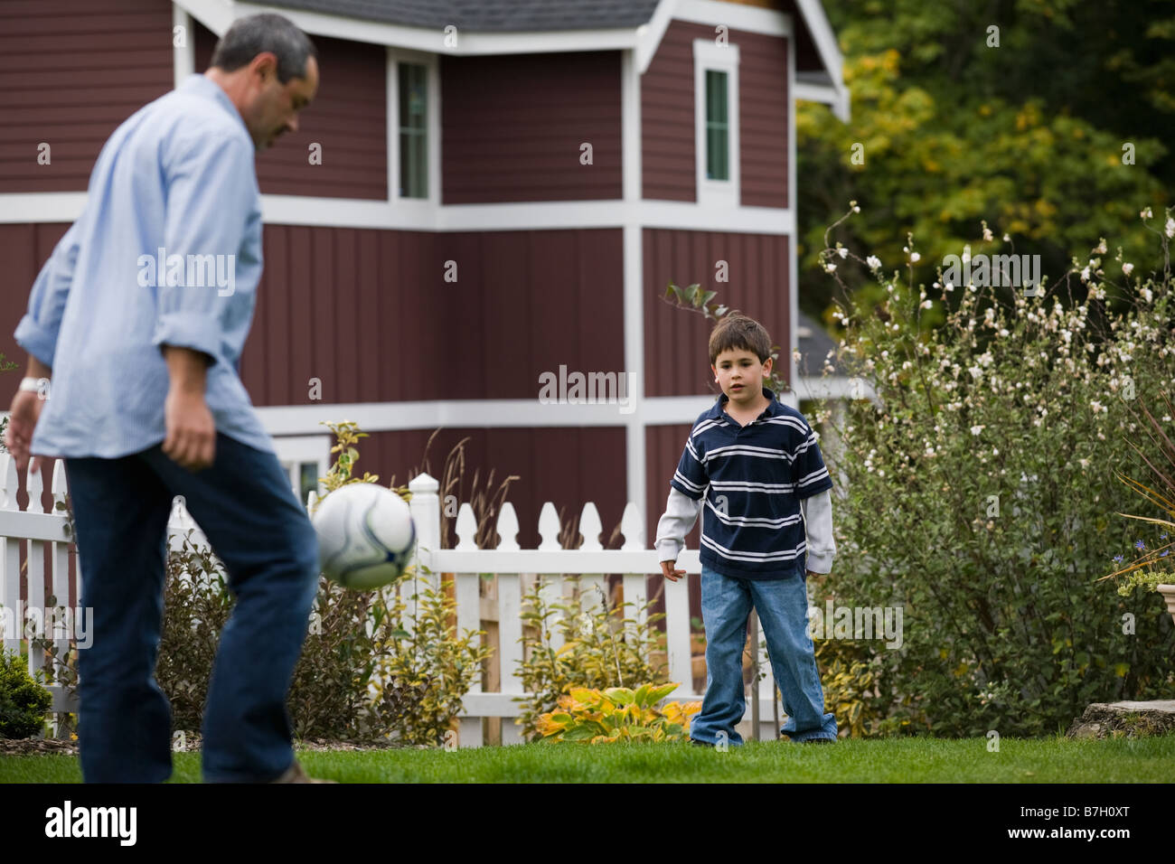 Father and son playing soccer Stock Photo - Alamy Father and son playing soccer Stock Photo - Alamy
