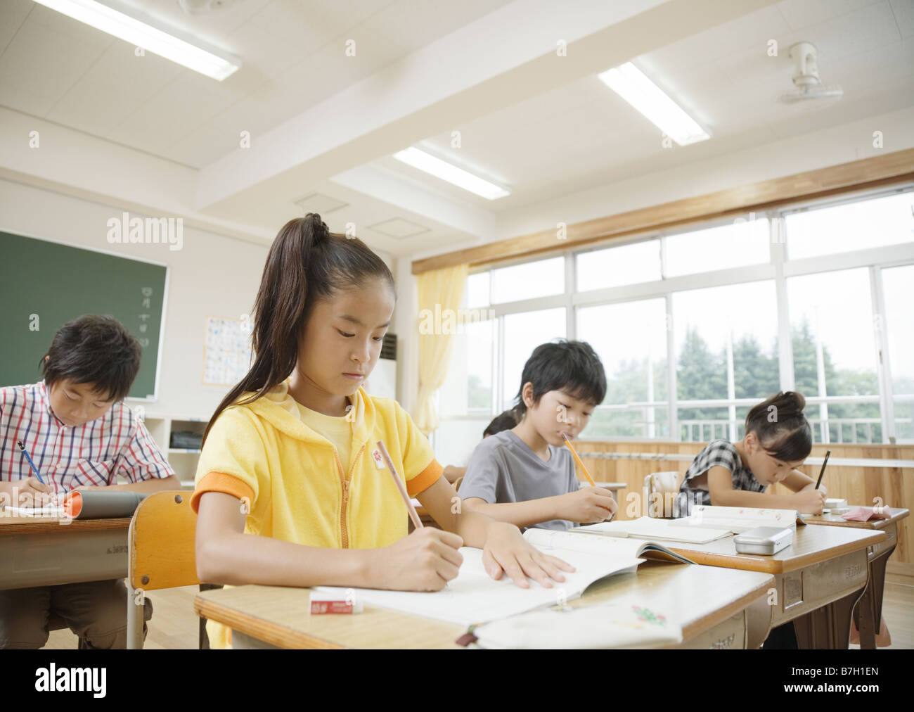 Elementary school students at school Stock Photo - Alamy