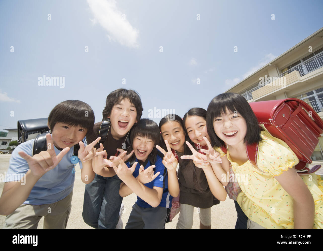 Elementary school students smiling Stock Photo - Alamy