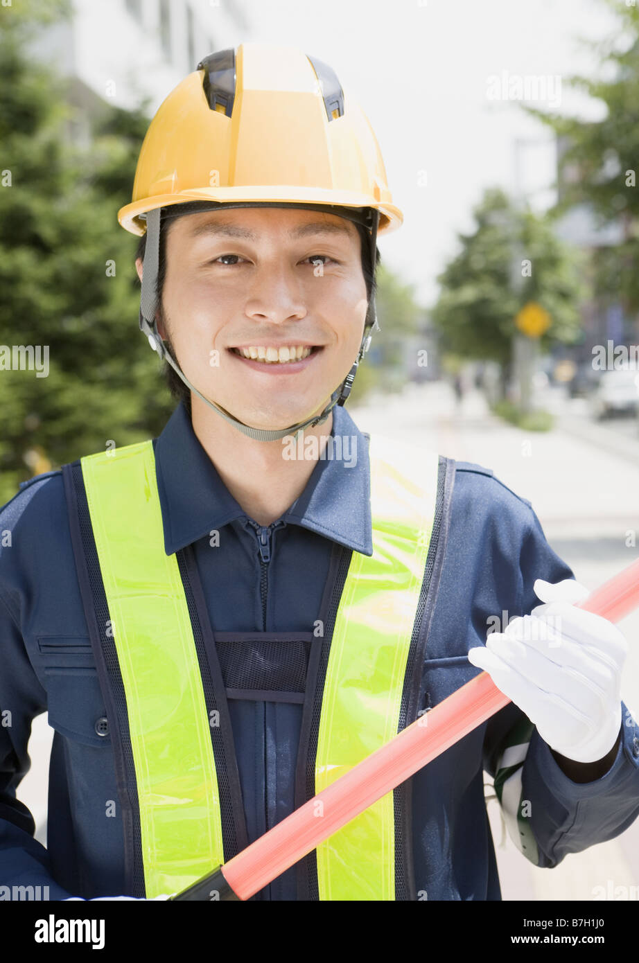 A smiling crossing guard Stock Photo - Alamy
