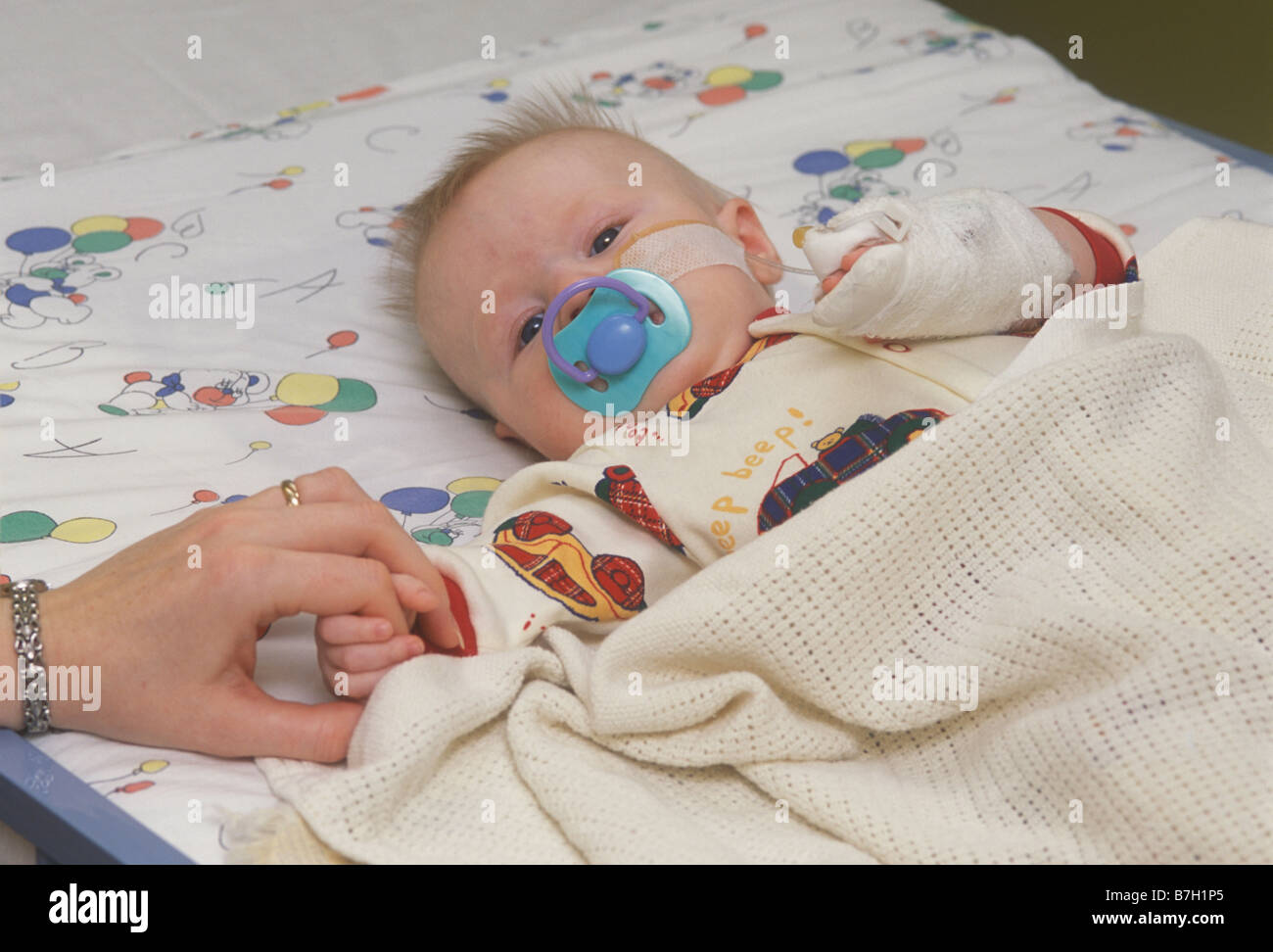 Baby recovering hospital bed hi-res stock photography and images - Alamy