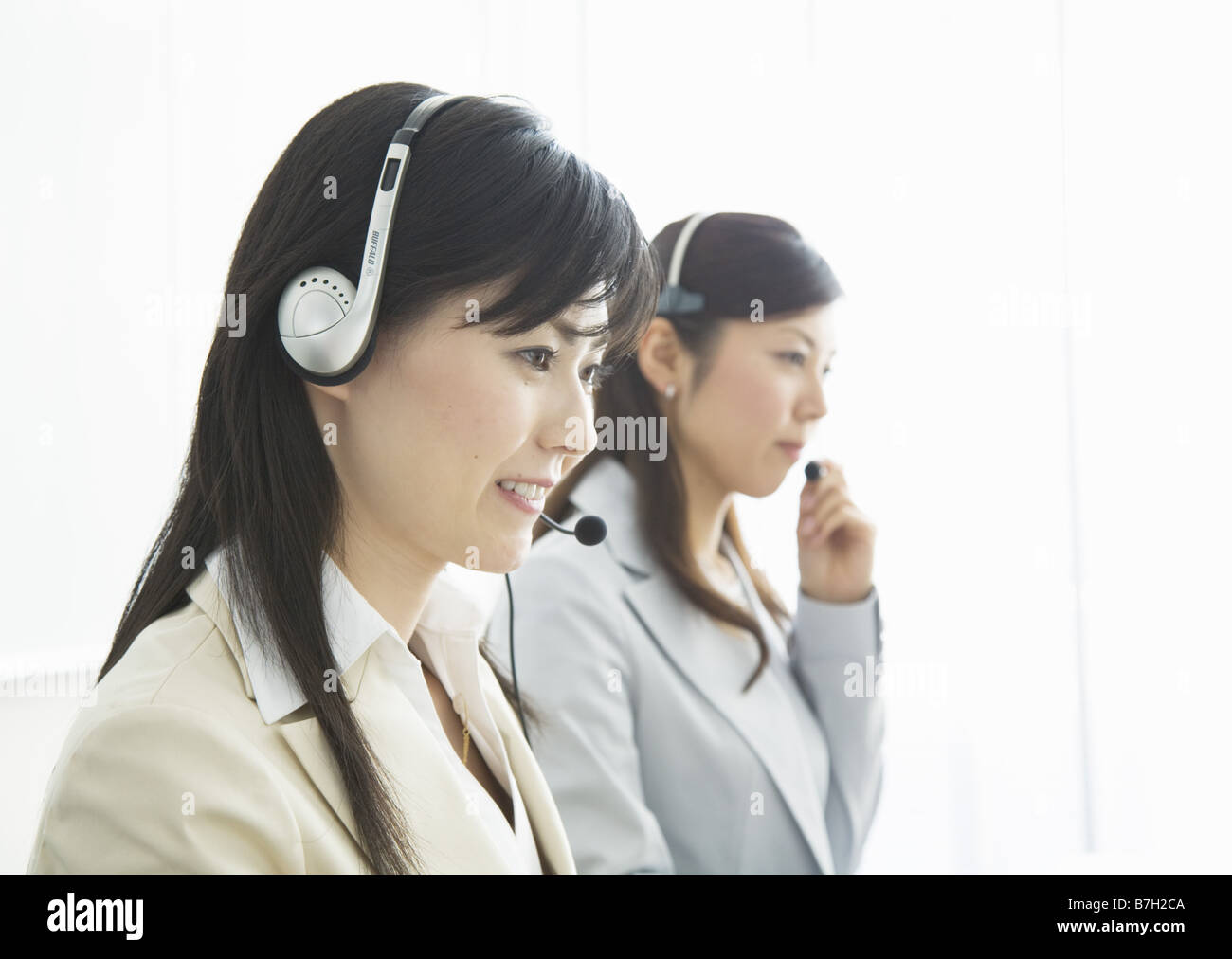 Operators at work in the office Stock Photo - Alamy