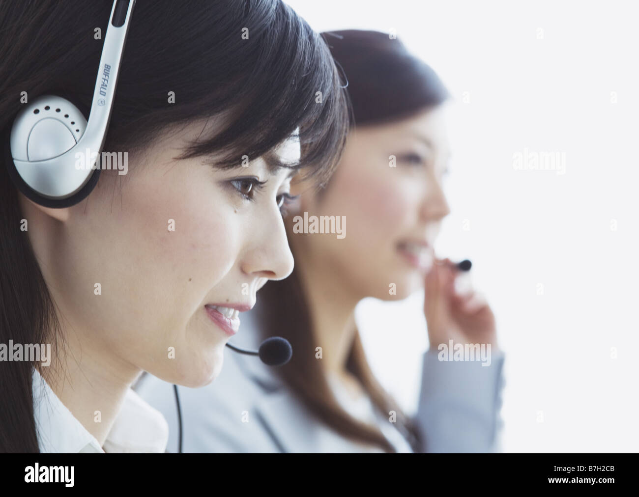 Operators working in the office Stock Photo - Alamy