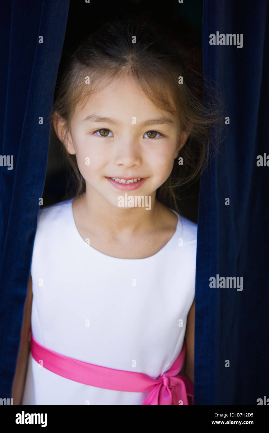 Young Asian flower girl smiling Stock Photo - Alamy