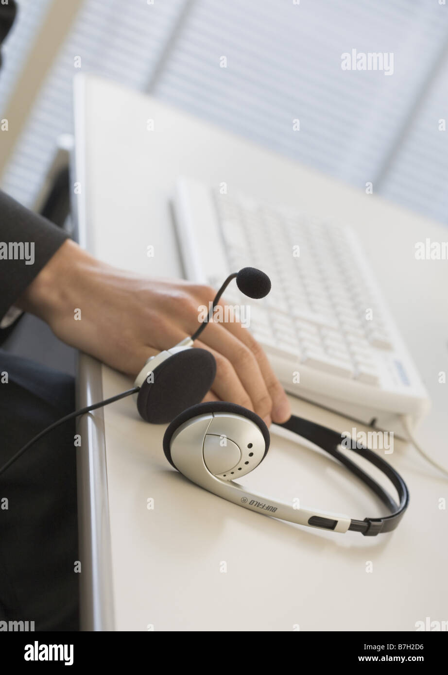 A headset on the desk Stock Photo - Alamy