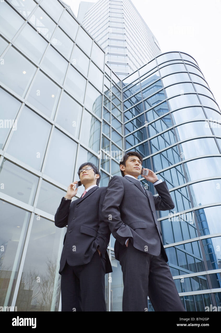 Group business people exiting building hi-res stock photography and ...