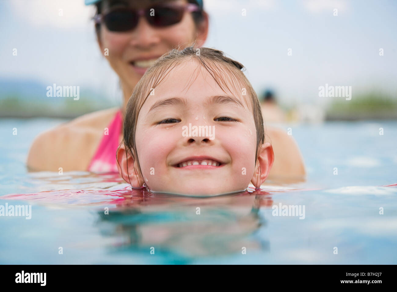 Mother Daughter Swimming Pool High Resolution Stock Photography and ...