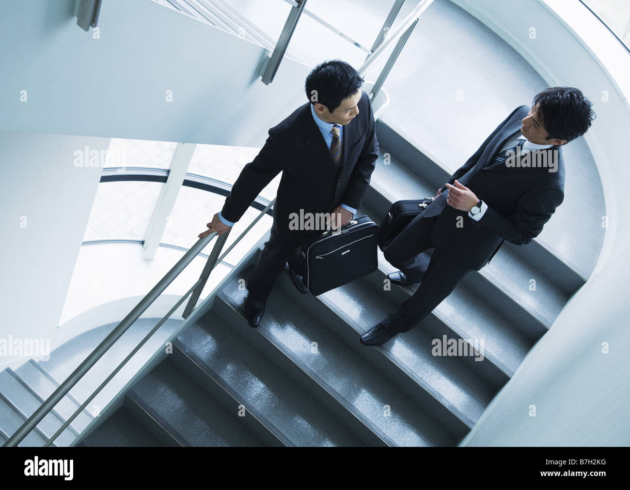 Group business people exiting building hi-res stock photography and ...