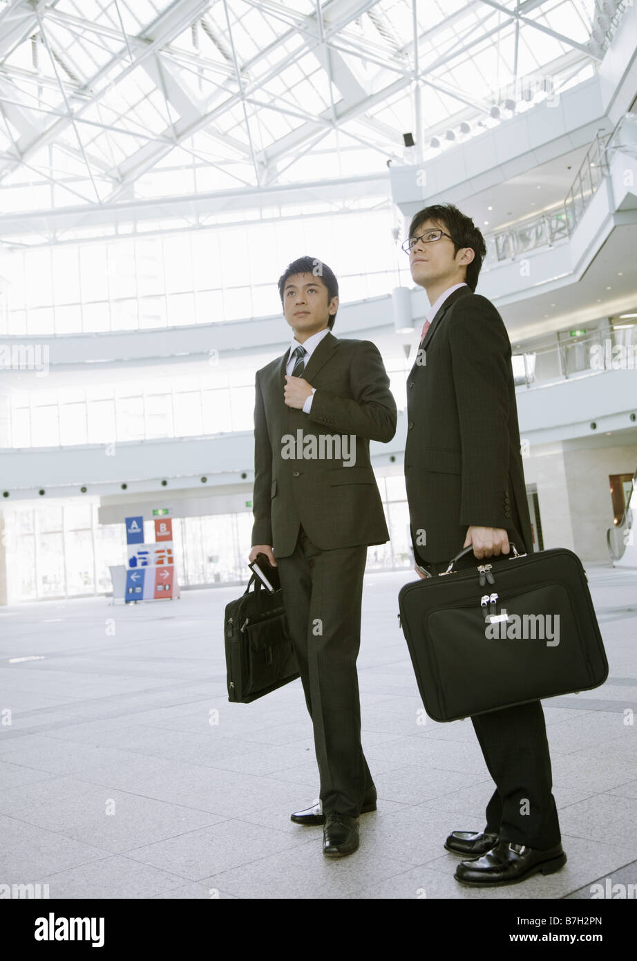 Group business people exiting building hi-res stock photography and ...