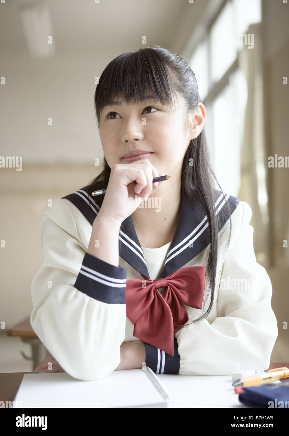 Female student in classroom Stock Photo - Alamy