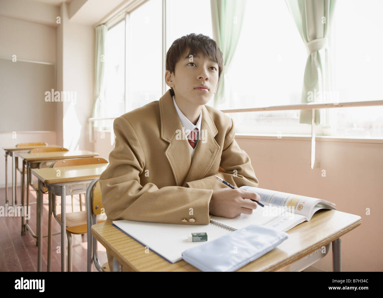 Student in classroom Stock Photo - Alamy