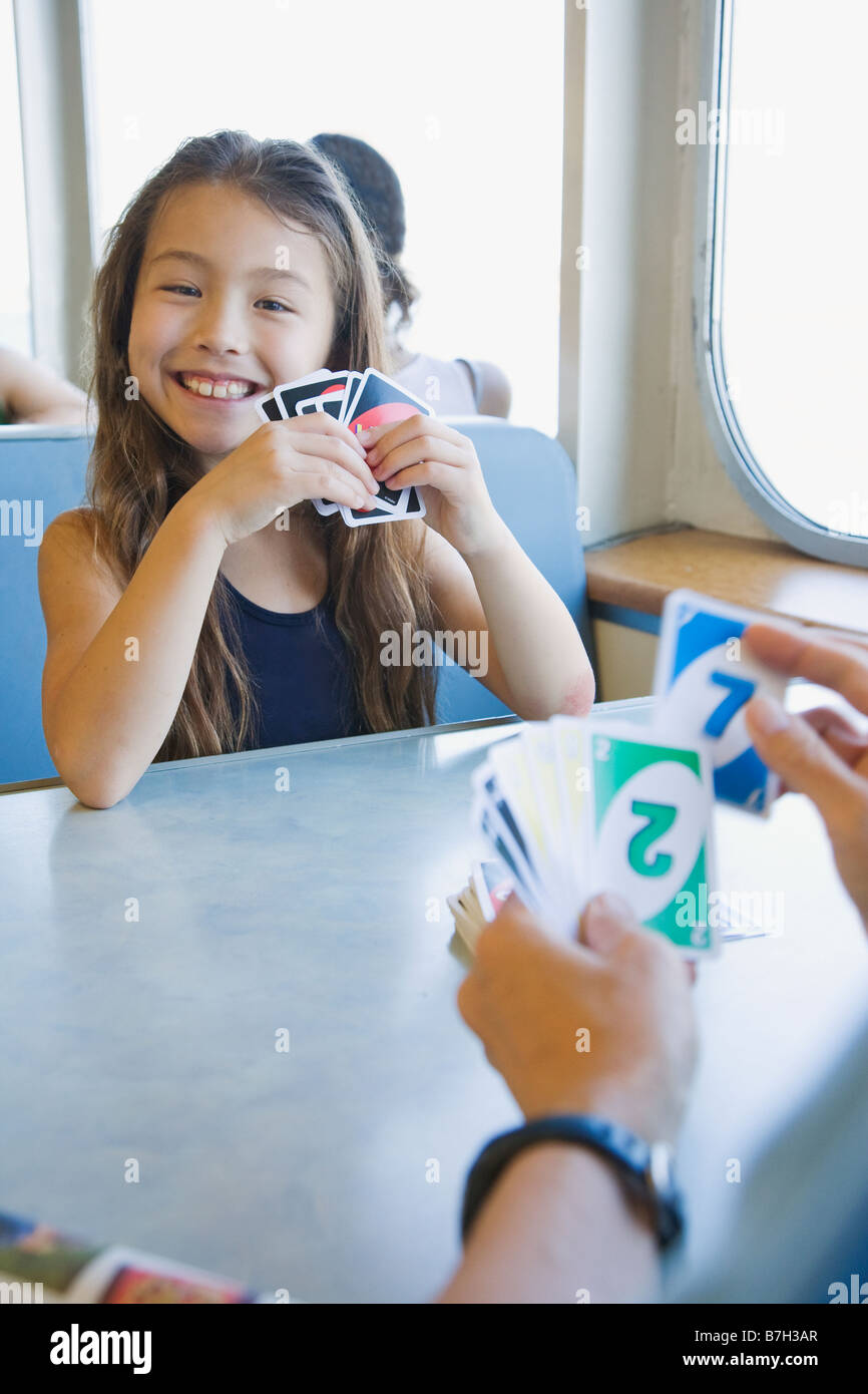 Asian women playing cards hi-res stock photography and images - Alamy