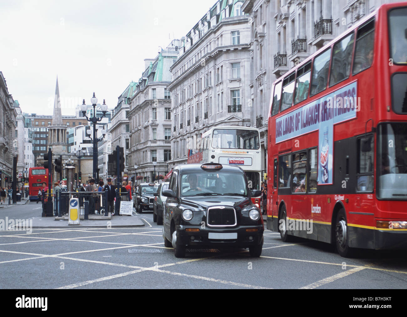 Red bus on roadway Stock Photo - Alamy