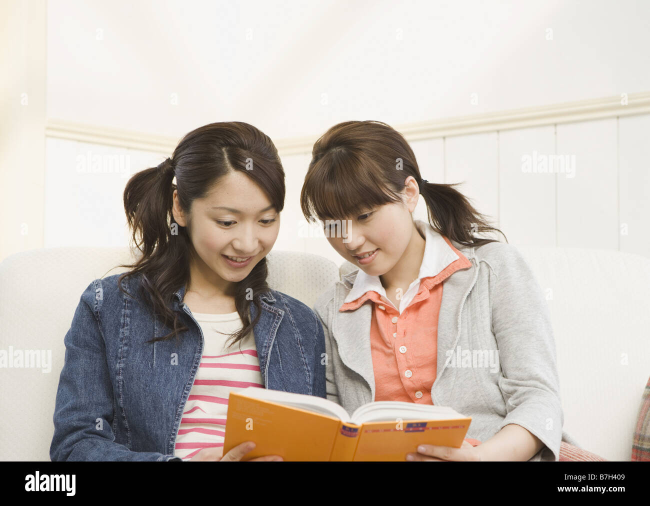Youth reading book Stock Photo - Alamy