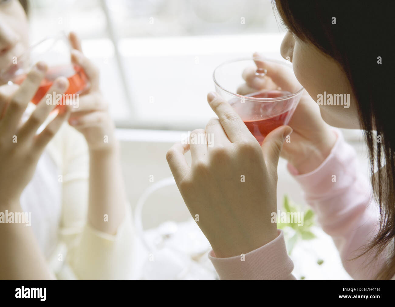 Women having afternoon tea Stock Photo - Alamy