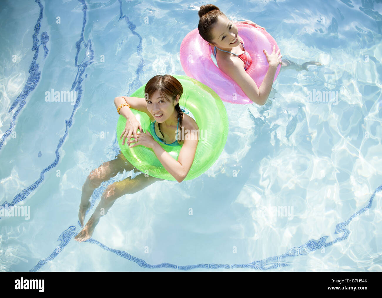 Women playing in pool Stock Photo - Alamy