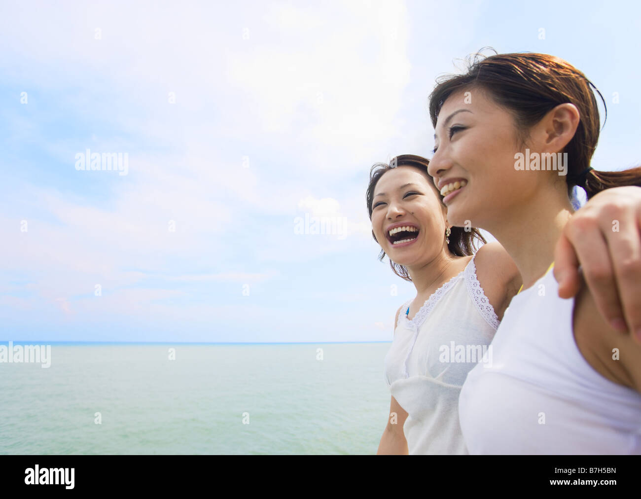 Women at seashore Stock Photo - Alamy